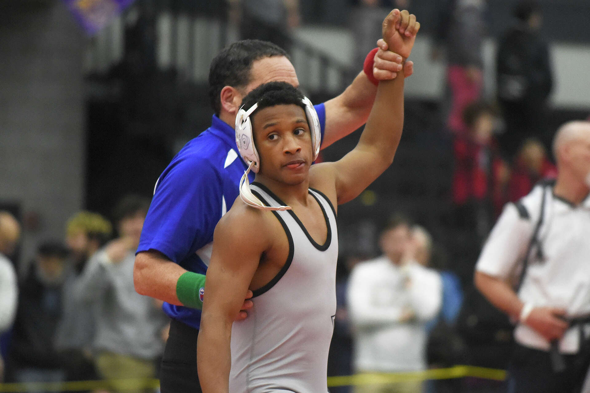 Xavier wrestling's Raekwon Shabazz beats champions from 14 states.