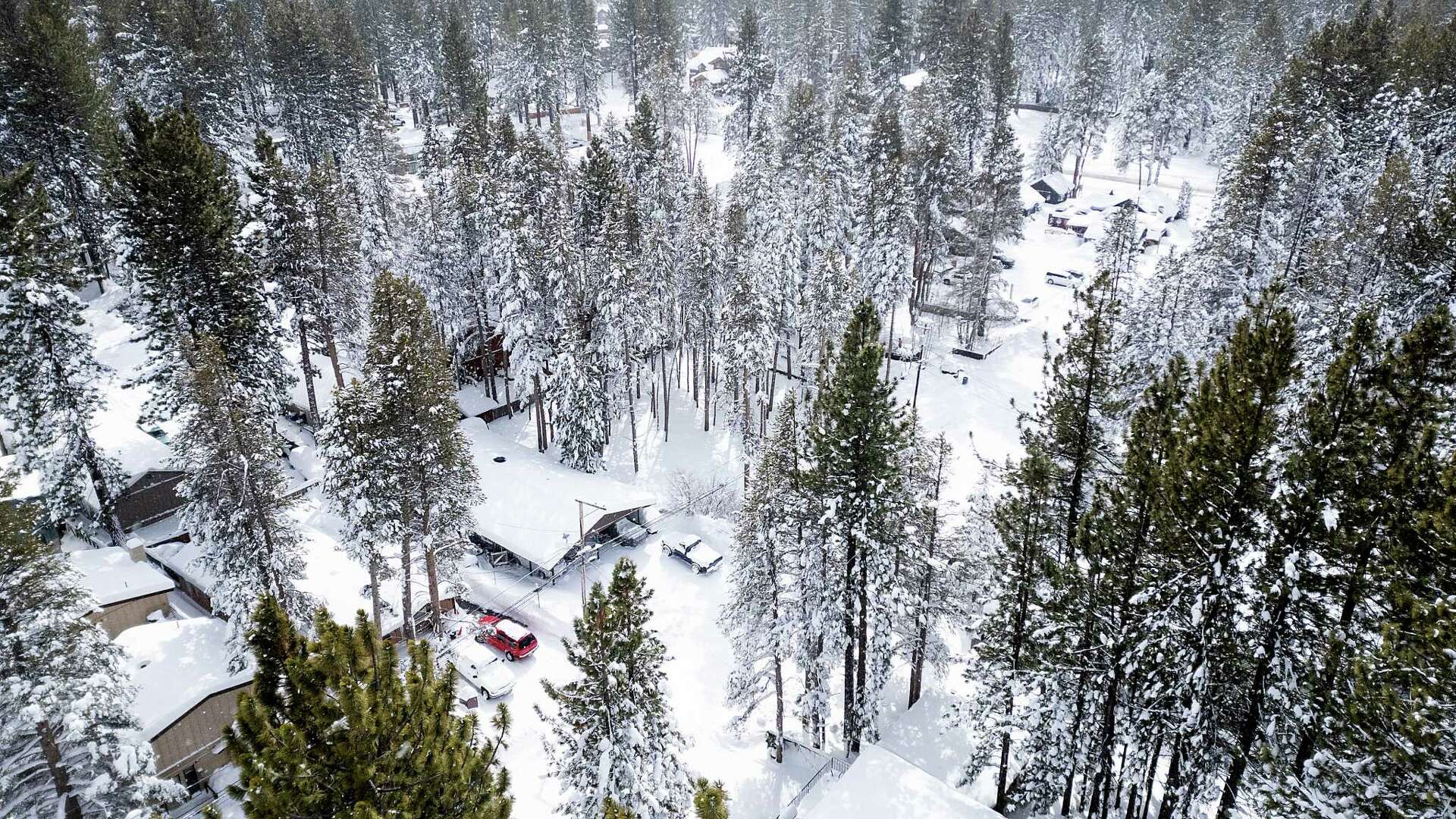 Photos show Tahoe-area homes, streets and cars under mounds of snow