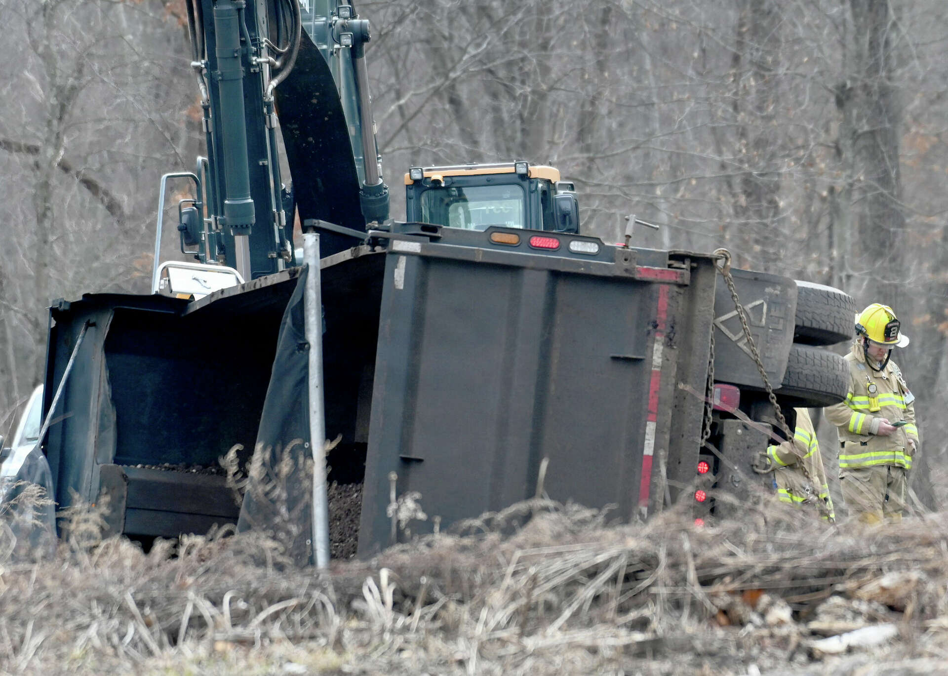 South Windsor dump truck crash causes fuel spill