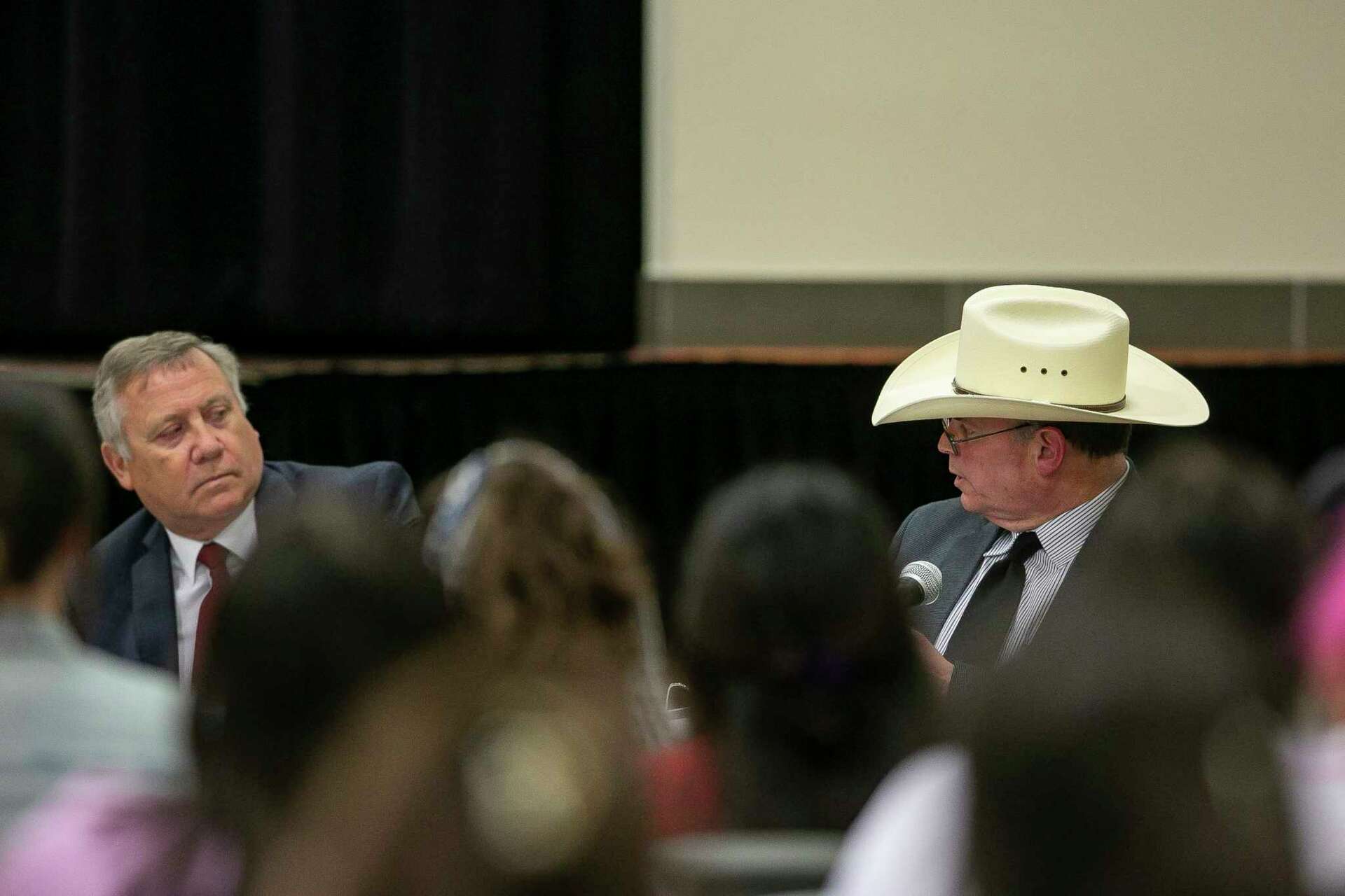 Uvalde police consultant criticized for keeping cowboy hat on