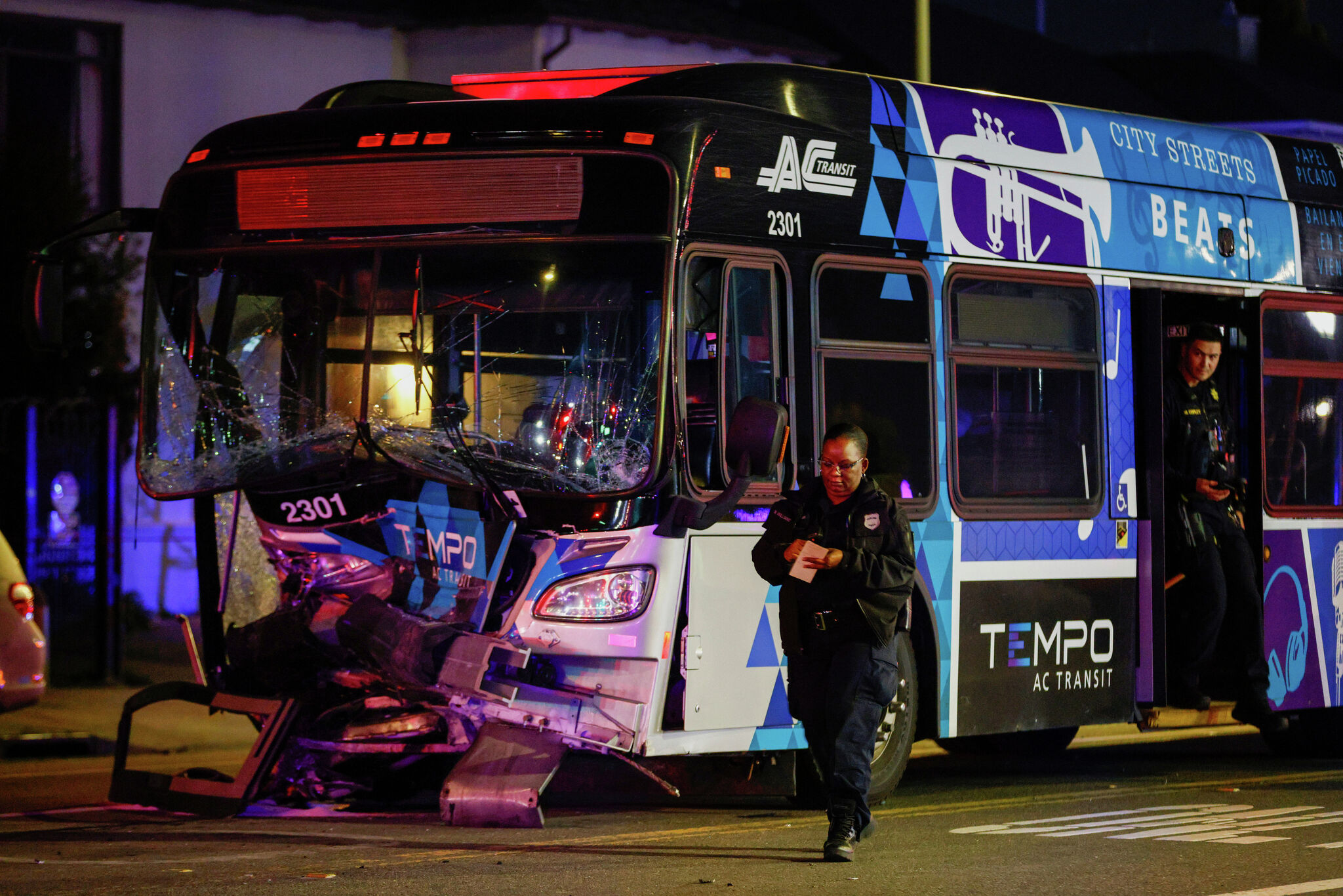 Car strikes AC Transit bus in Oakland, 14 injured
