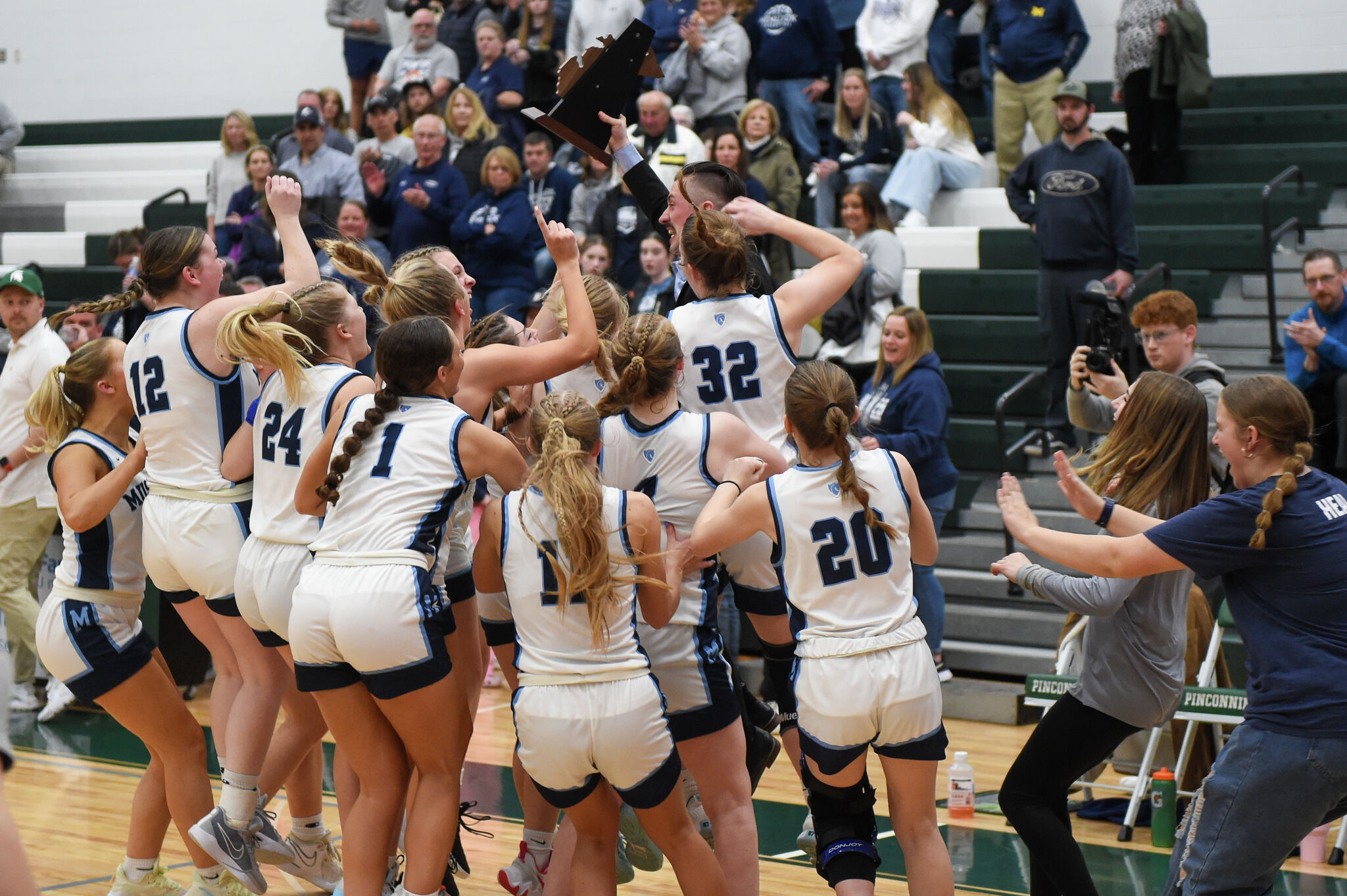Mustangs topple state champ Hemlock in electric district final
