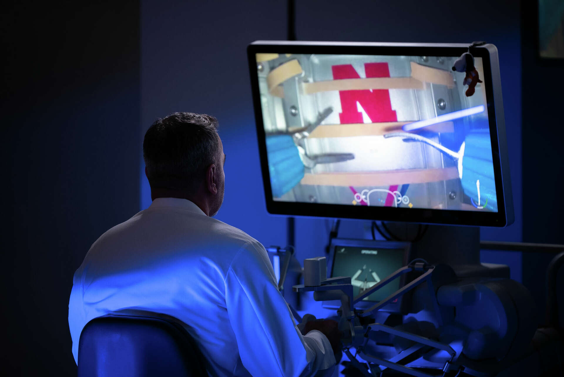 A Houston doctor is helping develop robots for remote space surgeries