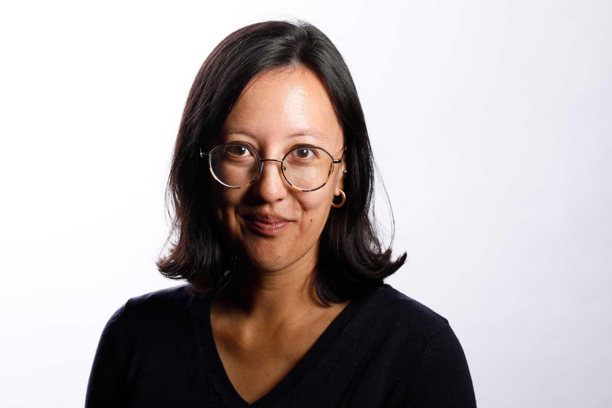 Janelle Bitker, Deputy Director of Content Strategy and Utility ...