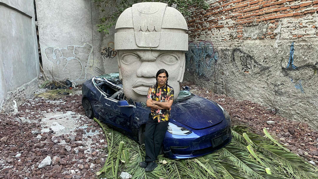 Mexican artist destroys a Tesla with 9-ton Olmec head