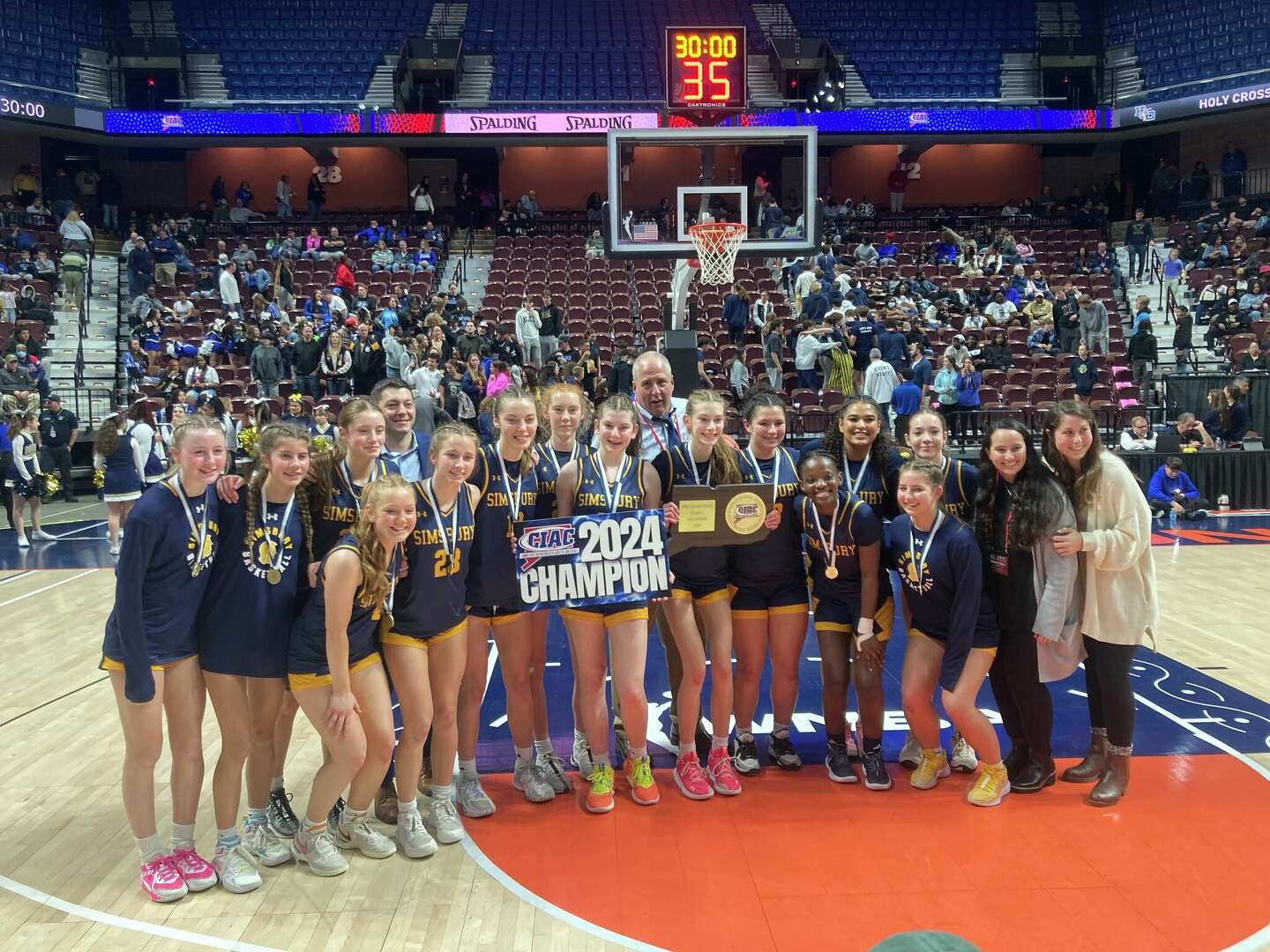 Simsbury girls defeat Holy Cross in CT high school basketball final.