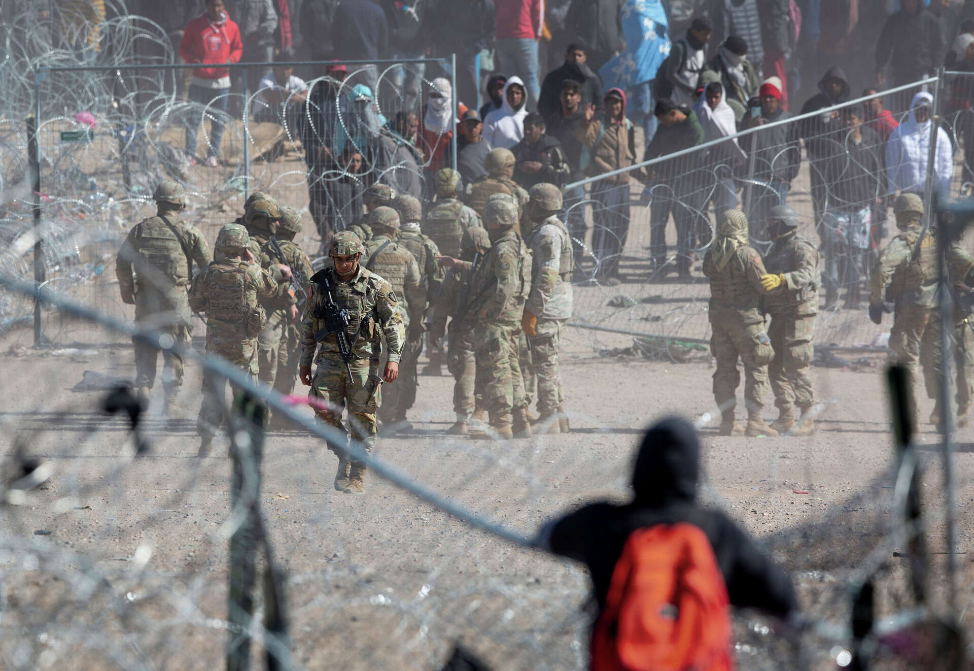 More than 200 migrants arrested after rushing El Paso border gate