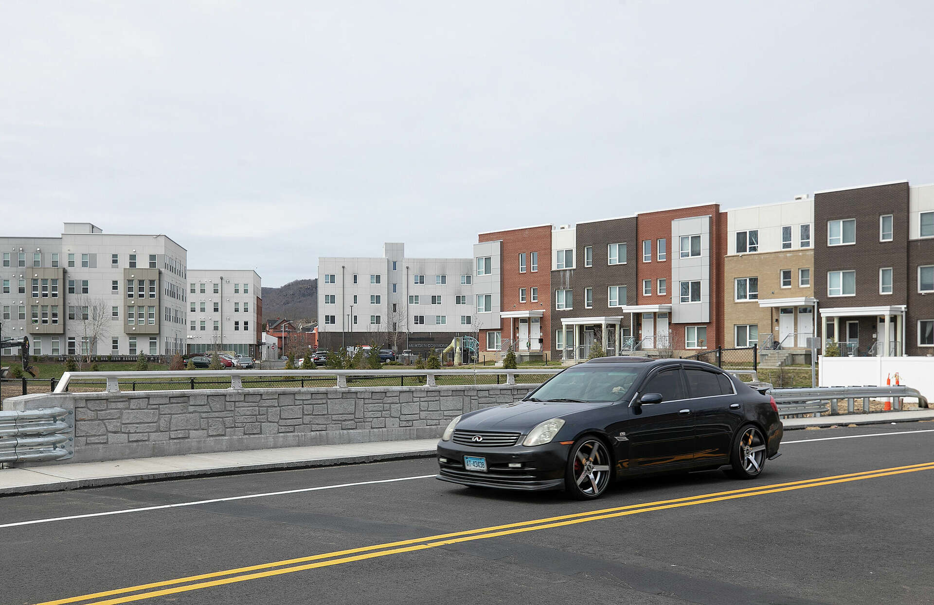 Meriden bridge reopens, another section of Harbor Brook uncovered