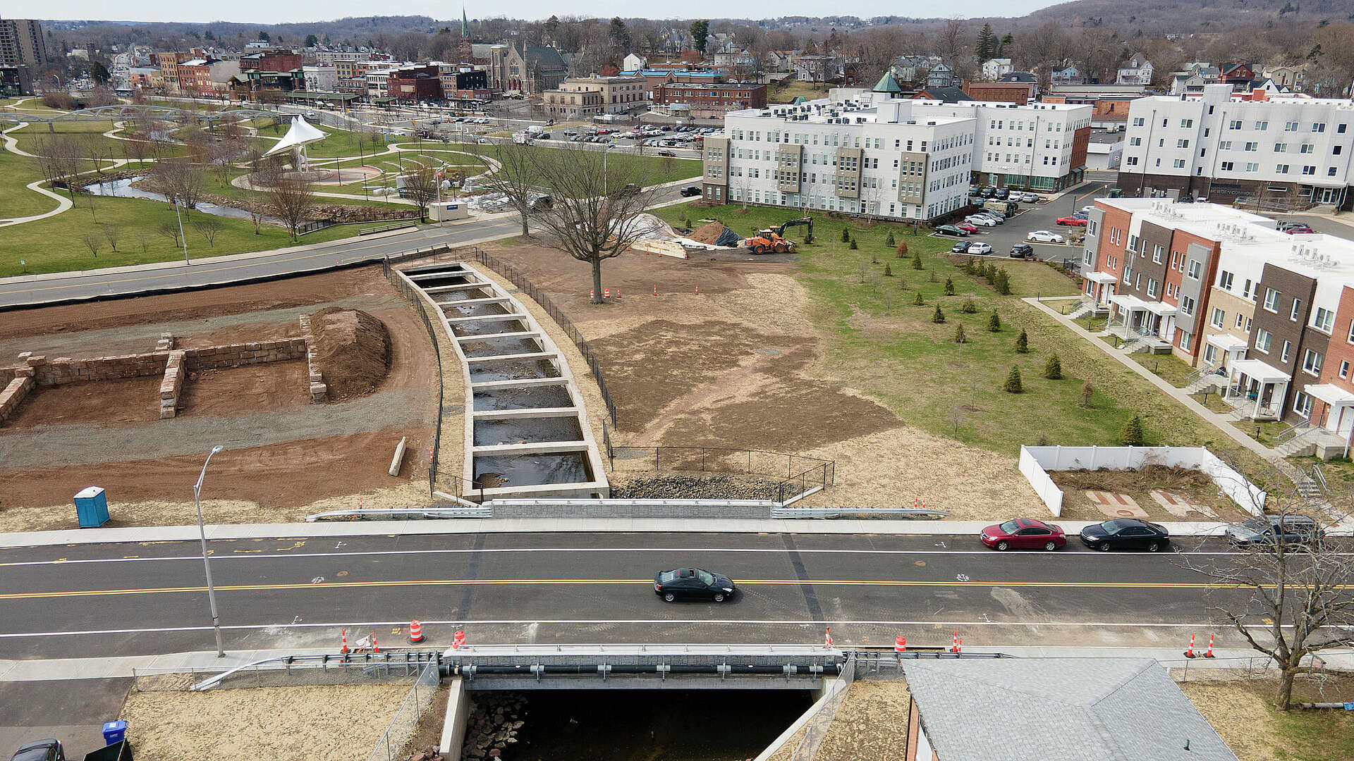 Meriden bridge reopens, another section of Harbor Brook uncovered