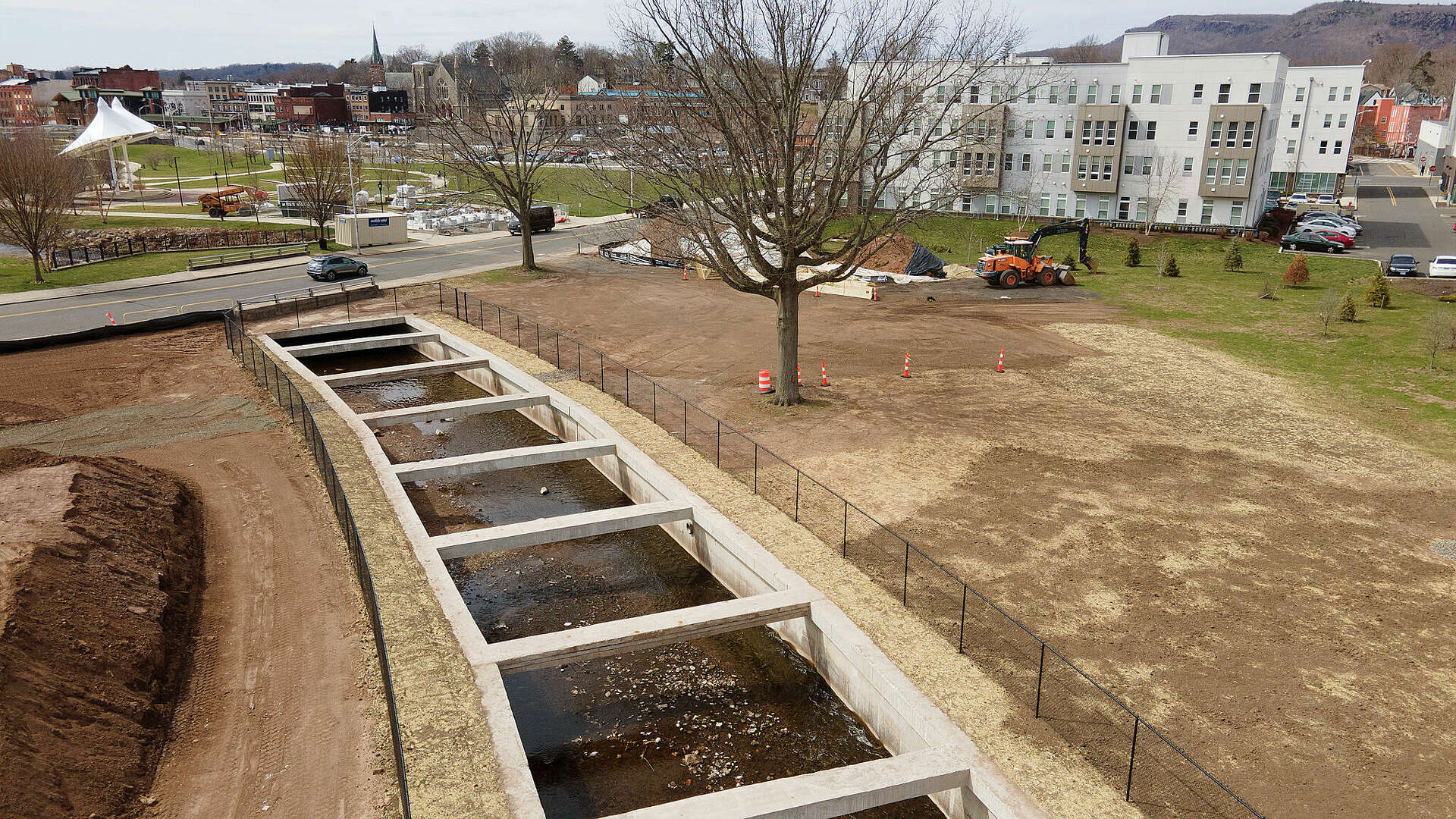 Meriden bridge reopens, another section of Harbor Brook uncovered