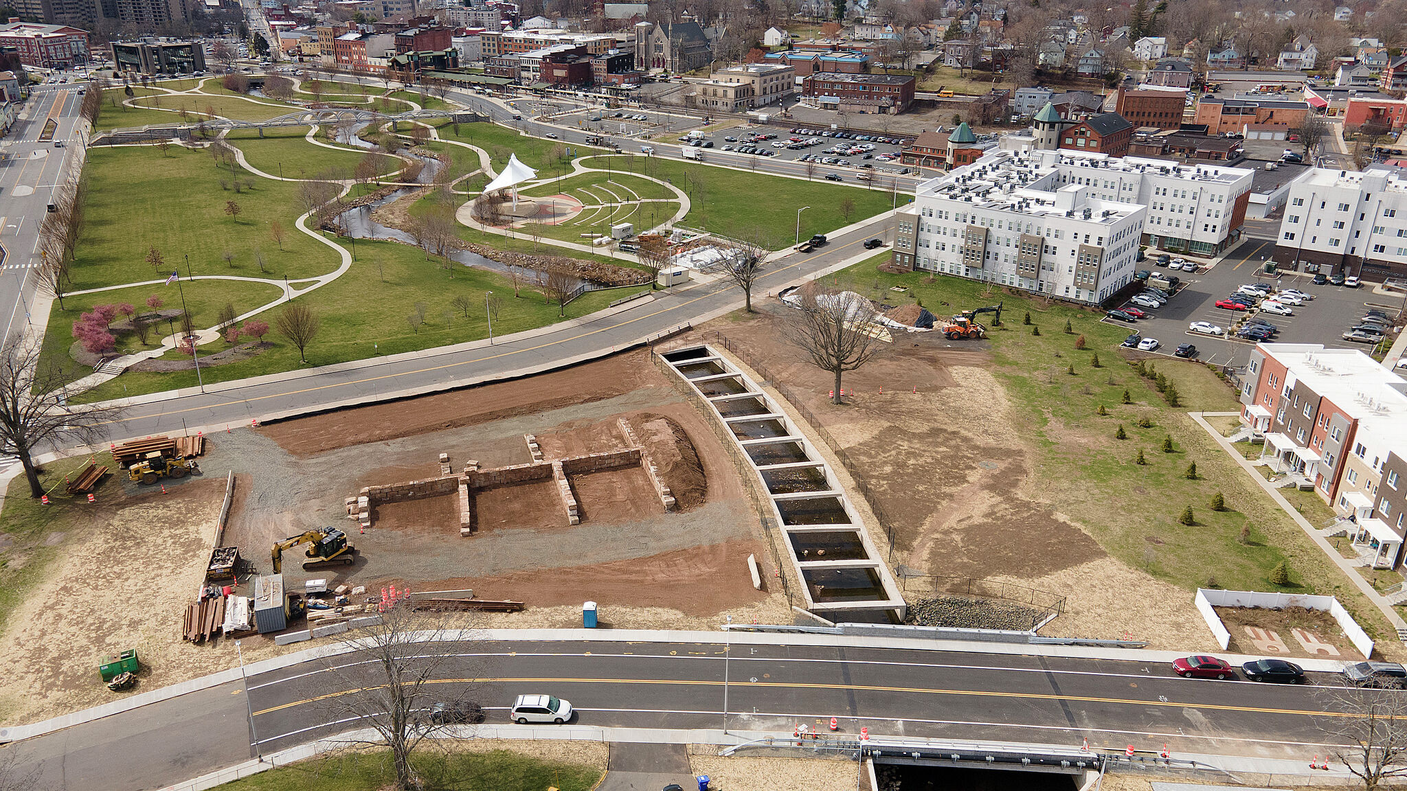 Meriden bridge reopens, another section of Harbor Brook uncovered