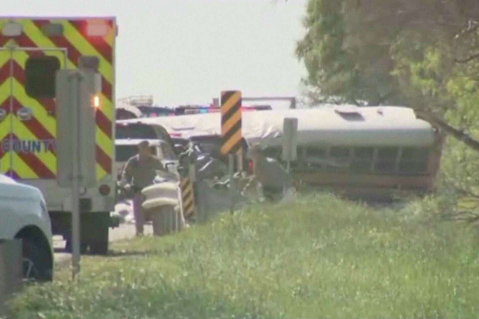 Two dead in rollover crash with school bus in Bastrop County