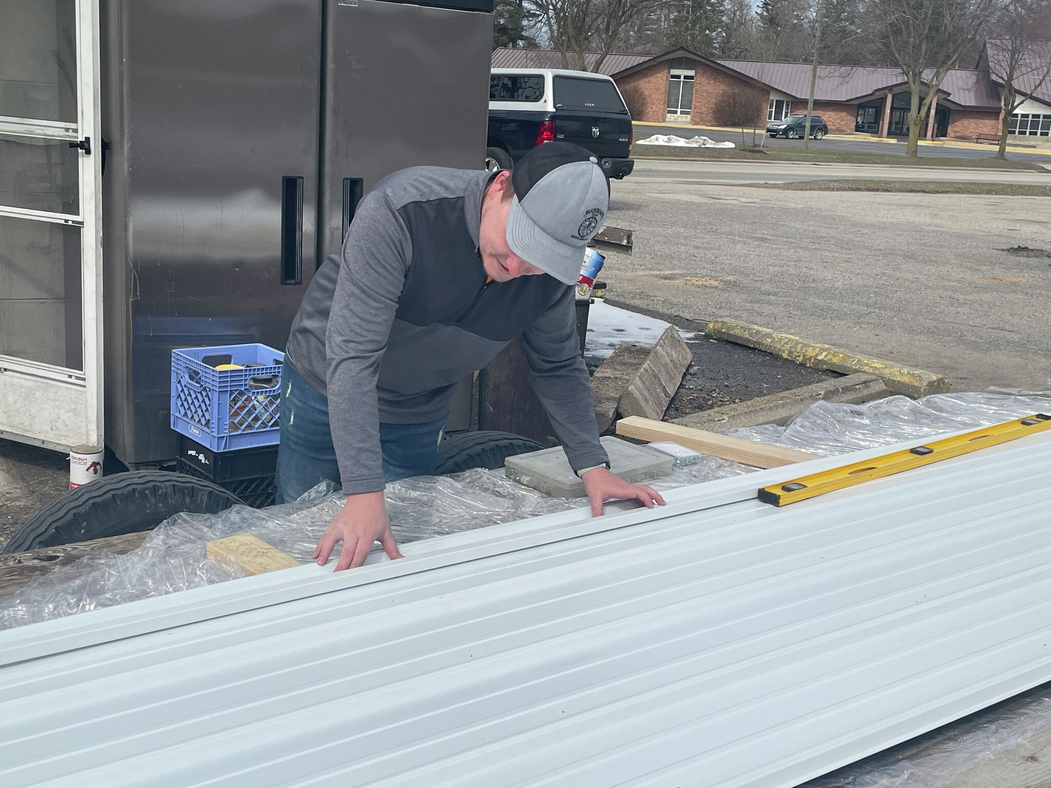 Reed City Dairy Depot owner Zach Huss prepares to open