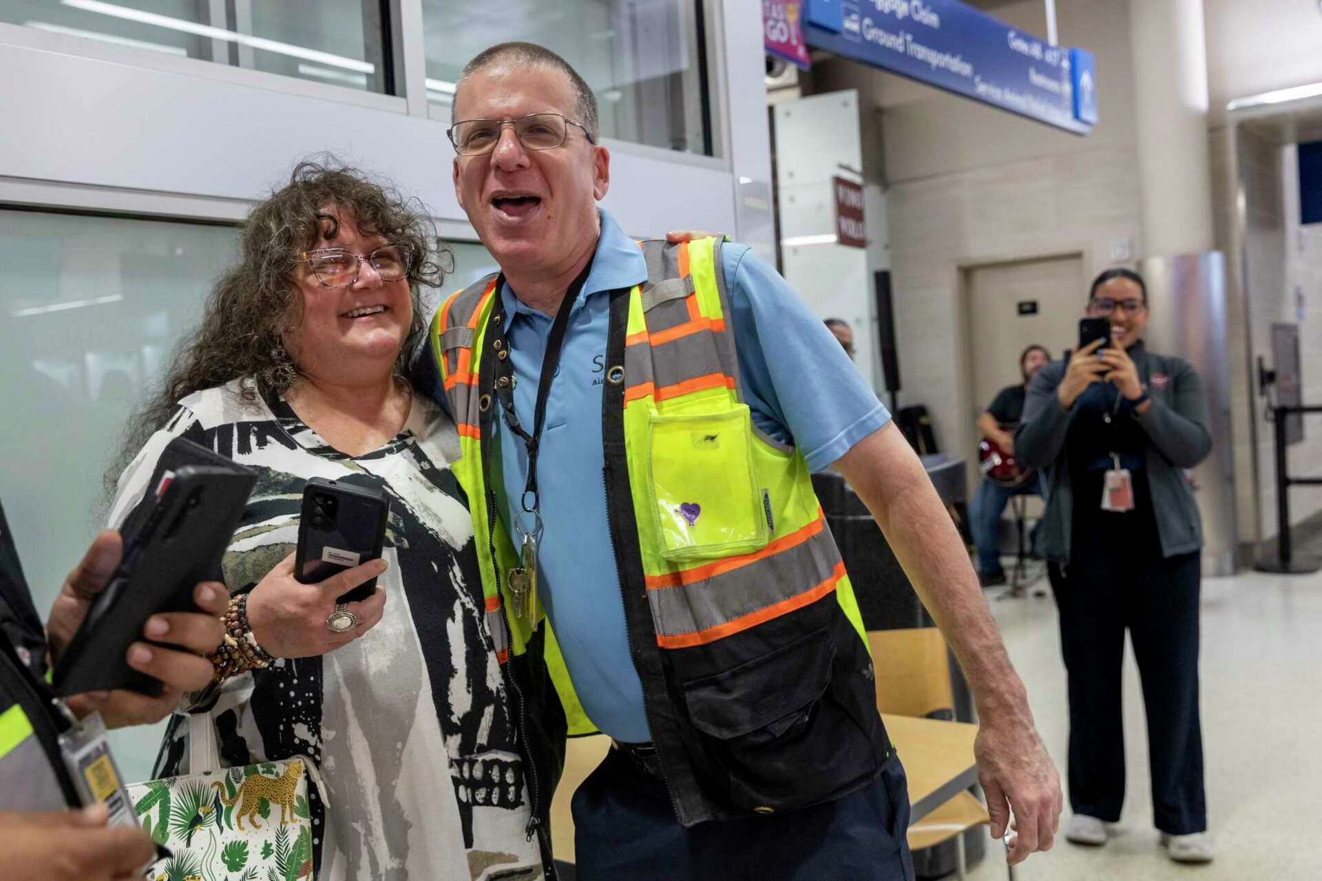 S.A. airport staff celebrate custodian known to lift spirits