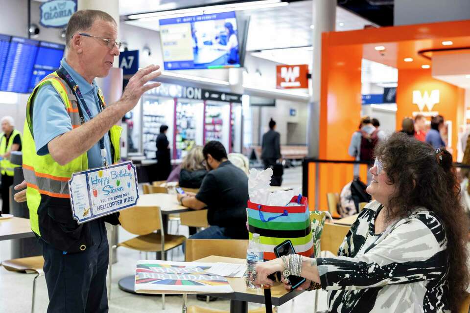 S.A. airport staff celebrate custodian known to lift spirits