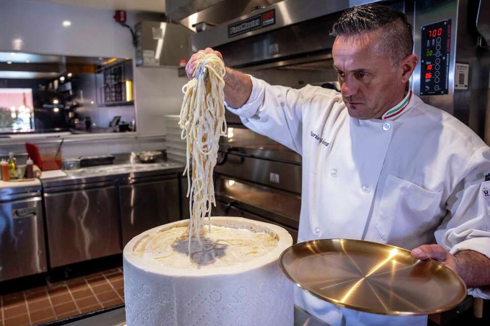 Bay Area restaurants are tossing pasta in giant wheels of cheese