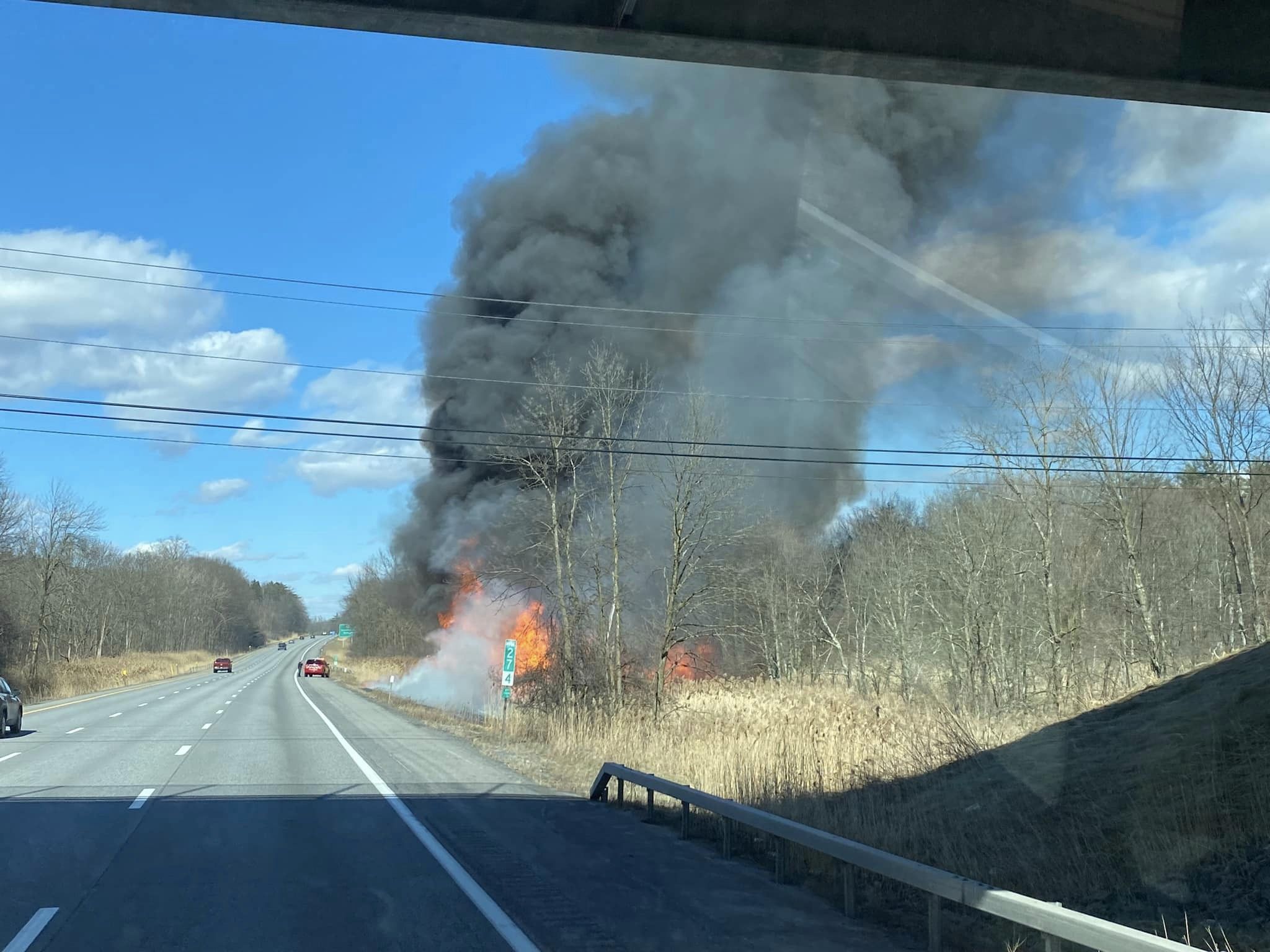 Firefighters battled brush fire on Northway
