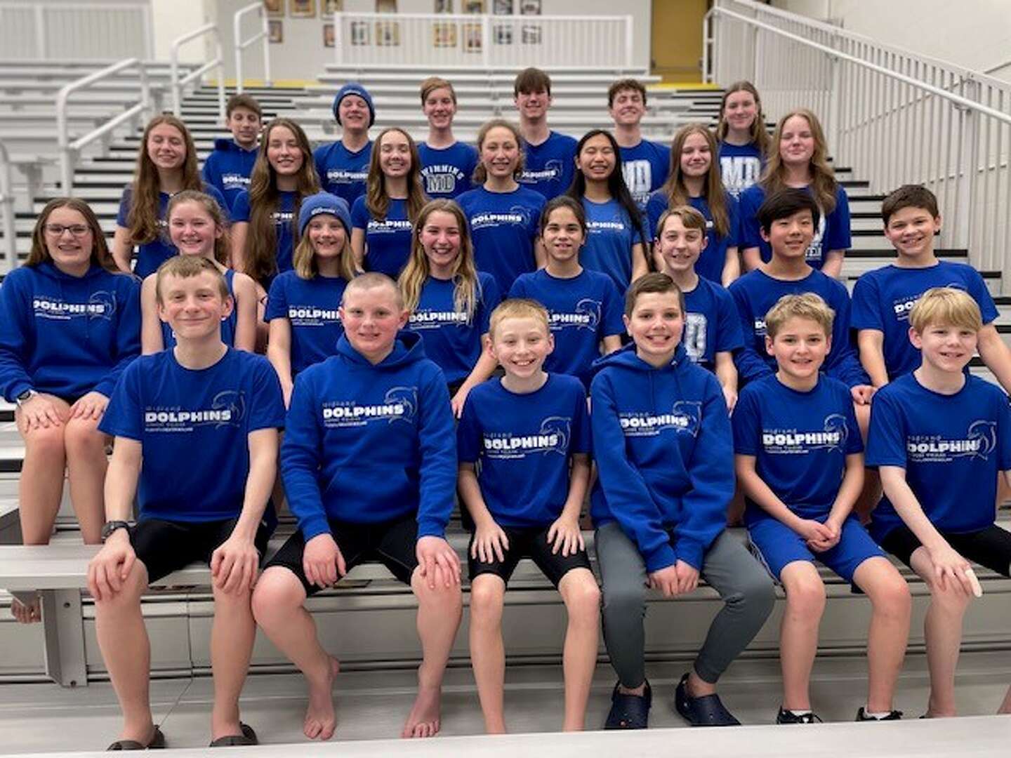 Midland Dolphins place at state, regional meets