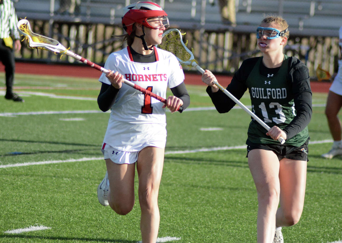 Guilford High School girls lacrosse defeats Branford in SCC match.