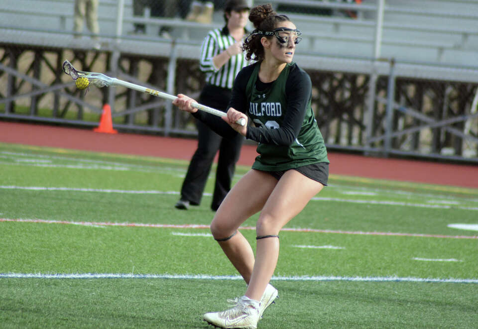 Guilford High School girls lacrosse defeats Branford in SCC match.