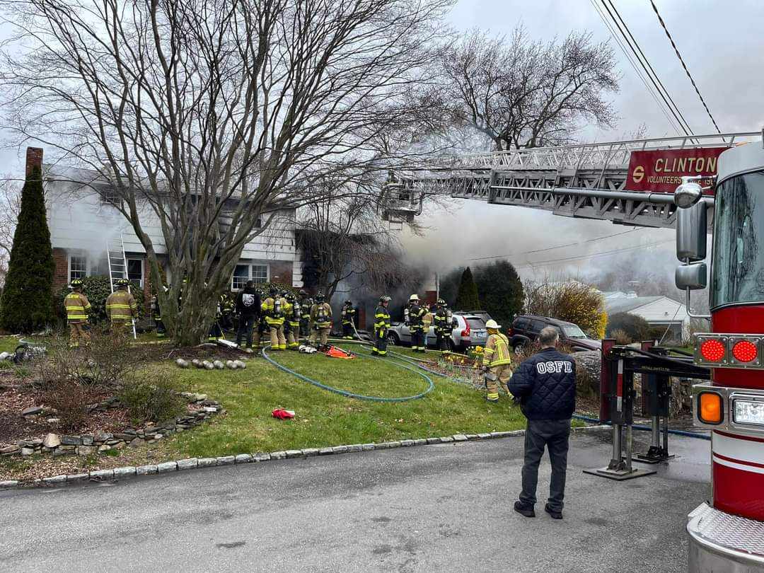 Crews extinguish fire at Clinton home that spread from garage