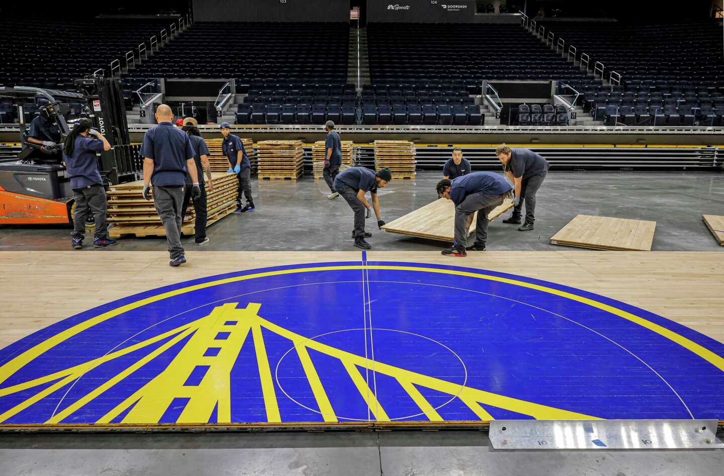 How the Warriors’ court is assembled, one 240-pound slab at a time