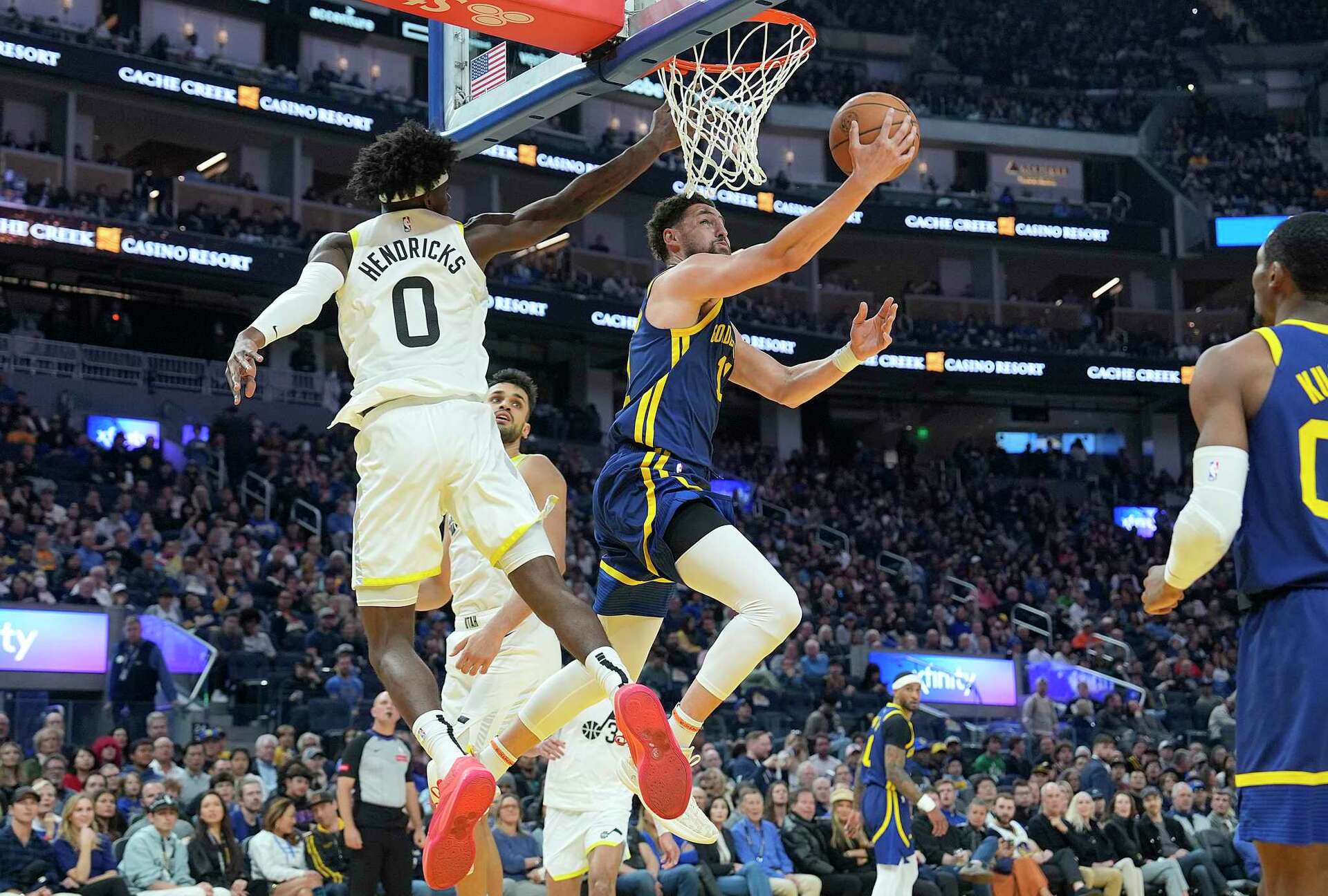 Thompson thrives, Kuminga returns as Warriors top Jazz as Curry sits