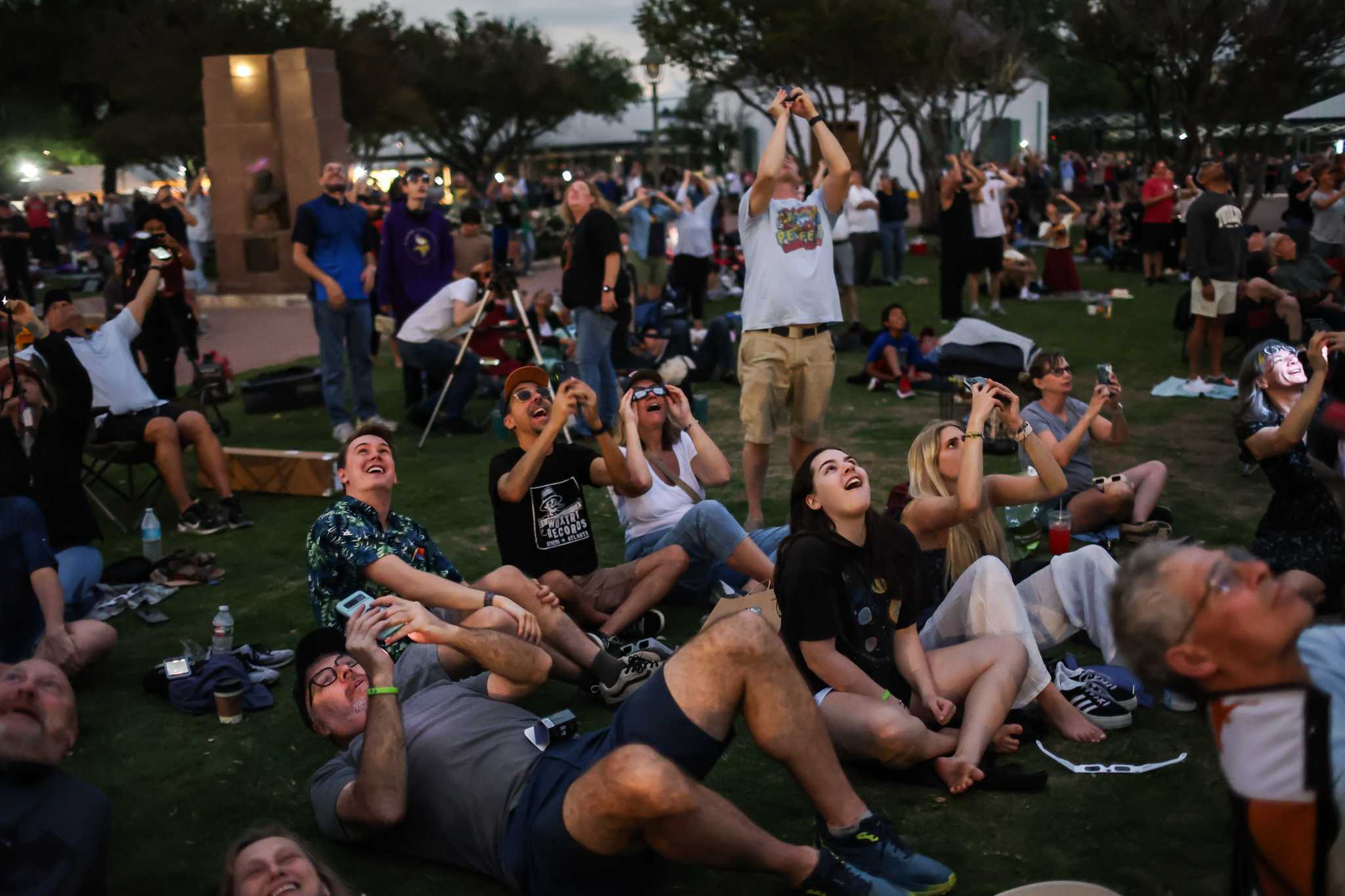 Cloudy skies slow Texas eclipse party, but don't stop it