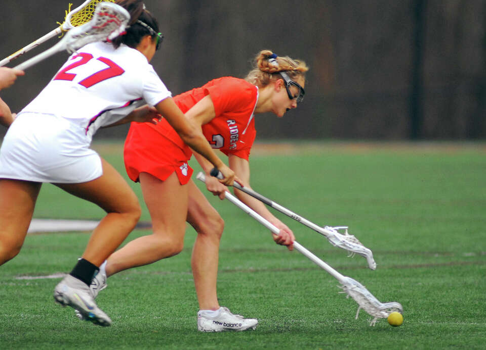 New Canaan girls lacrosse overcomes challenge from Ridgefield