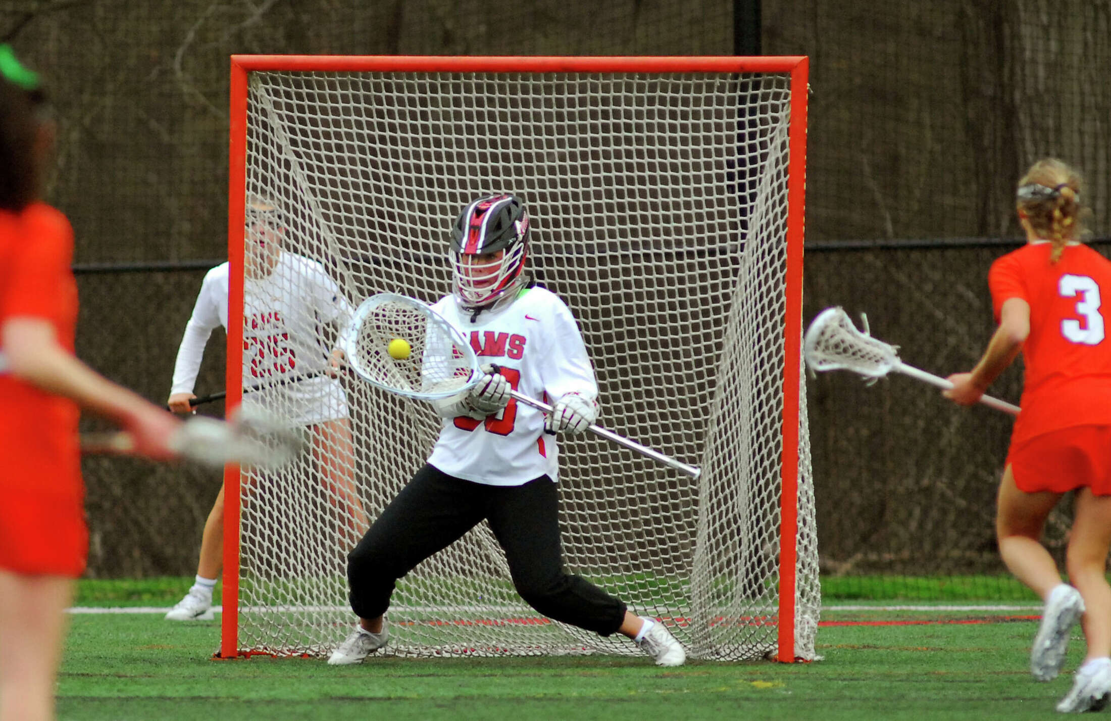 New Canaan girls lacrosse overcomes challenge from Ridgefield