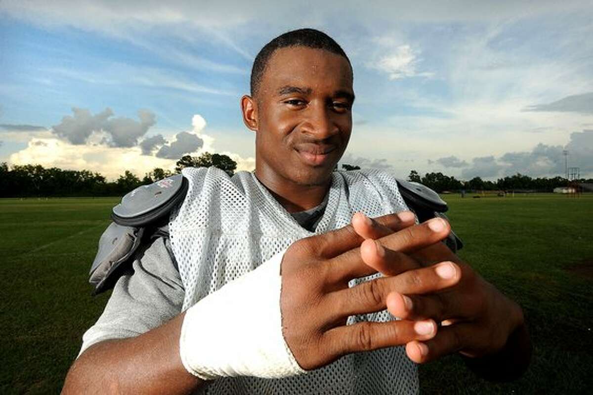West Brook player plays football with help of sign interpreter
