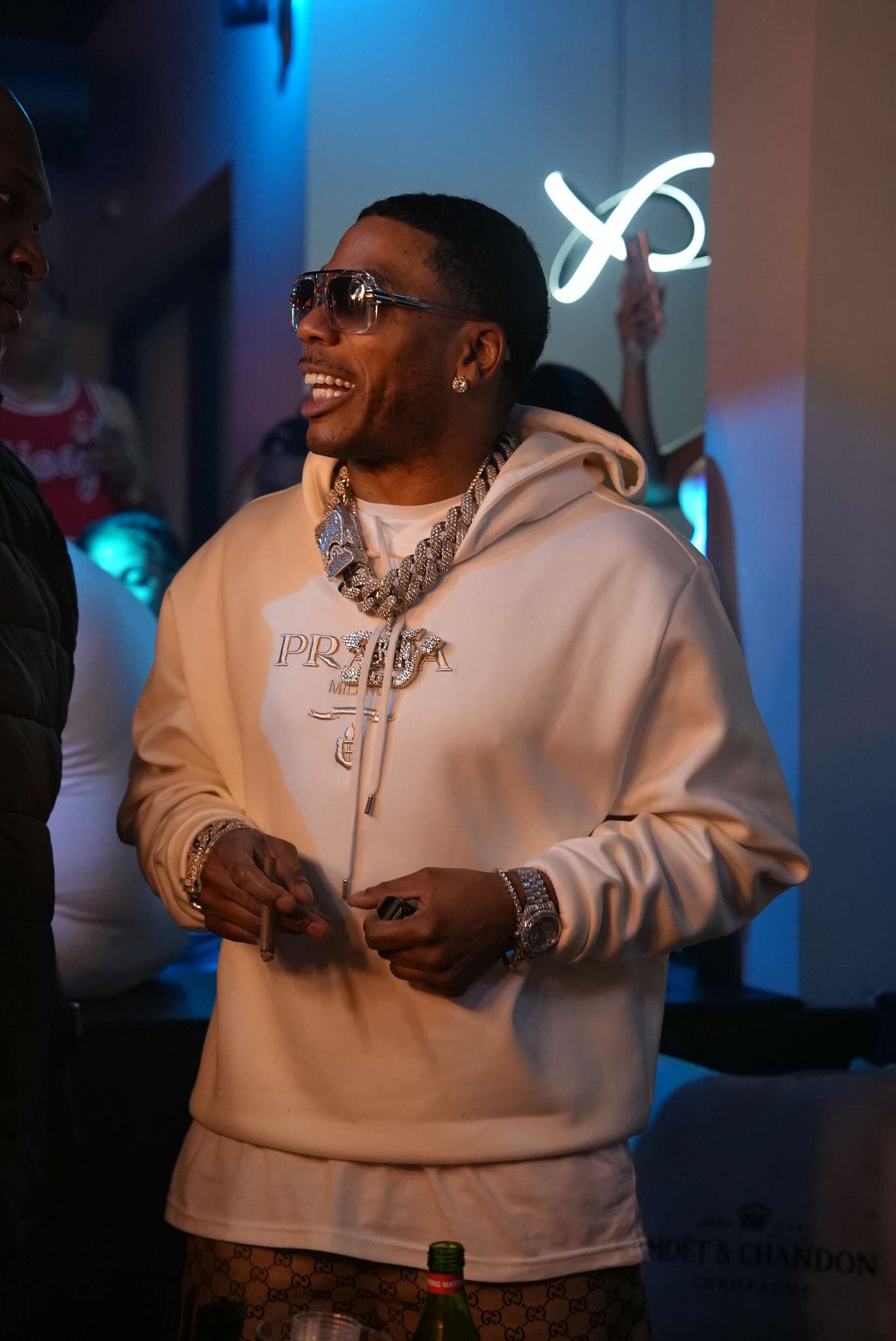 Rapper Nelly seen relaxing at Houston club’s VIP section