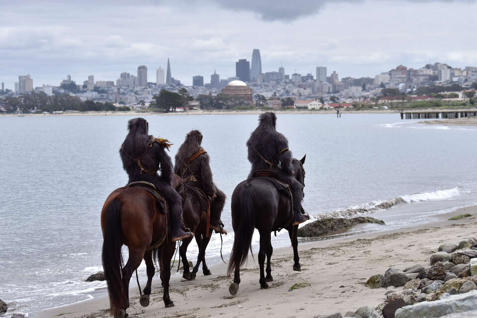 Costumed apes seen on horseback ride through San Francisco