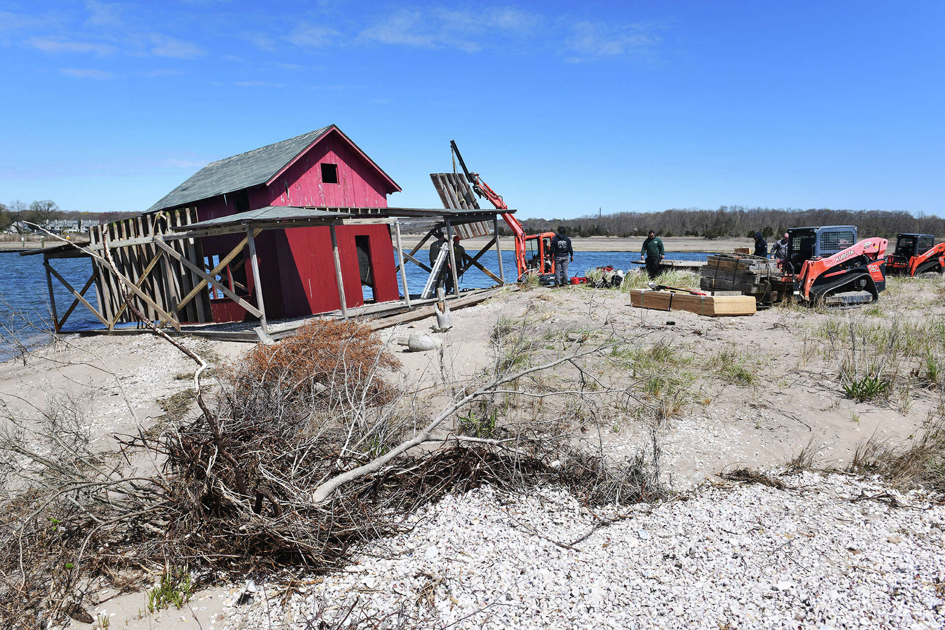 Local contractors work to save iconic red shack in Guilford