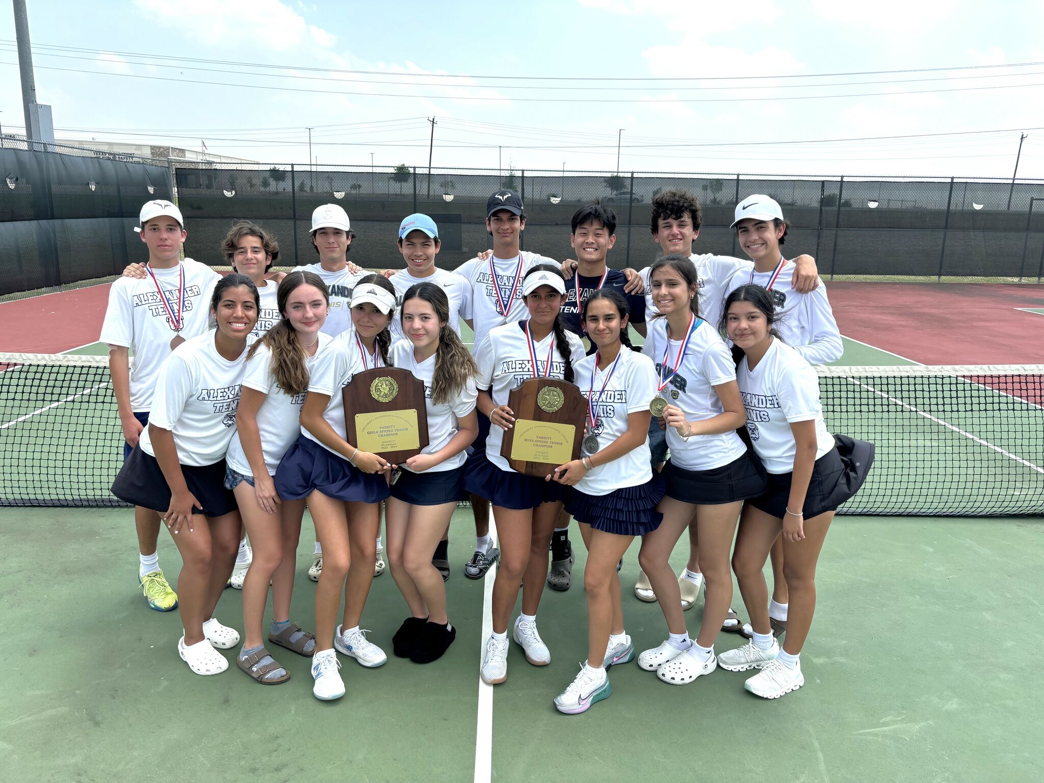 Alexander tennis teams win district titles