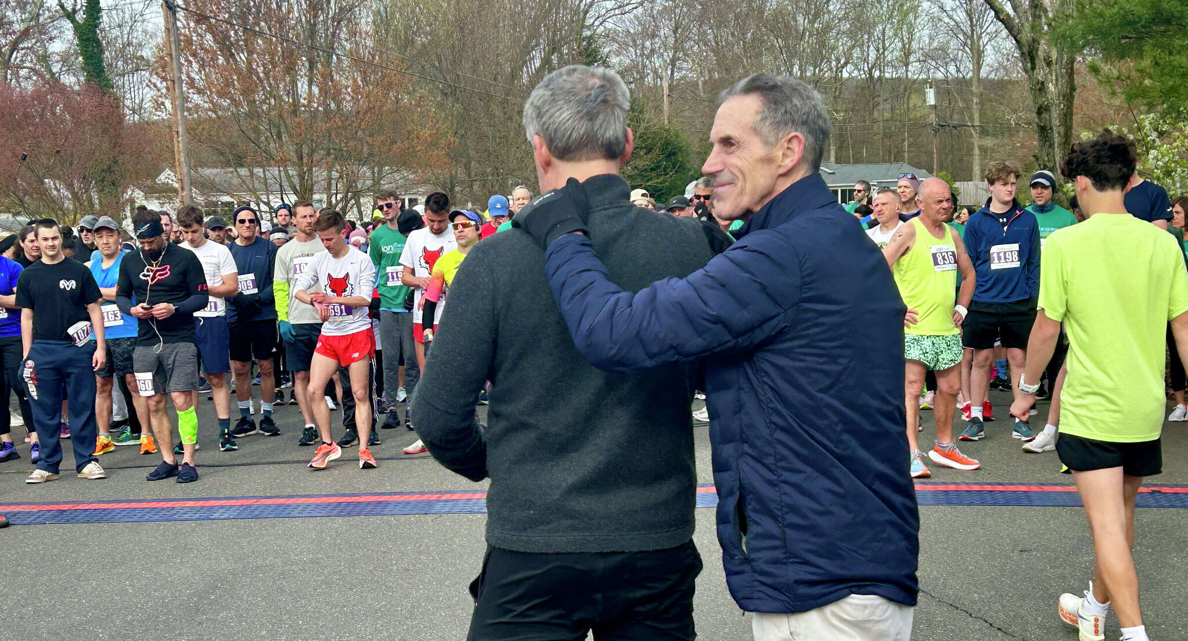 Race announcer Mark Gilhuly accepts award for fight against cancer