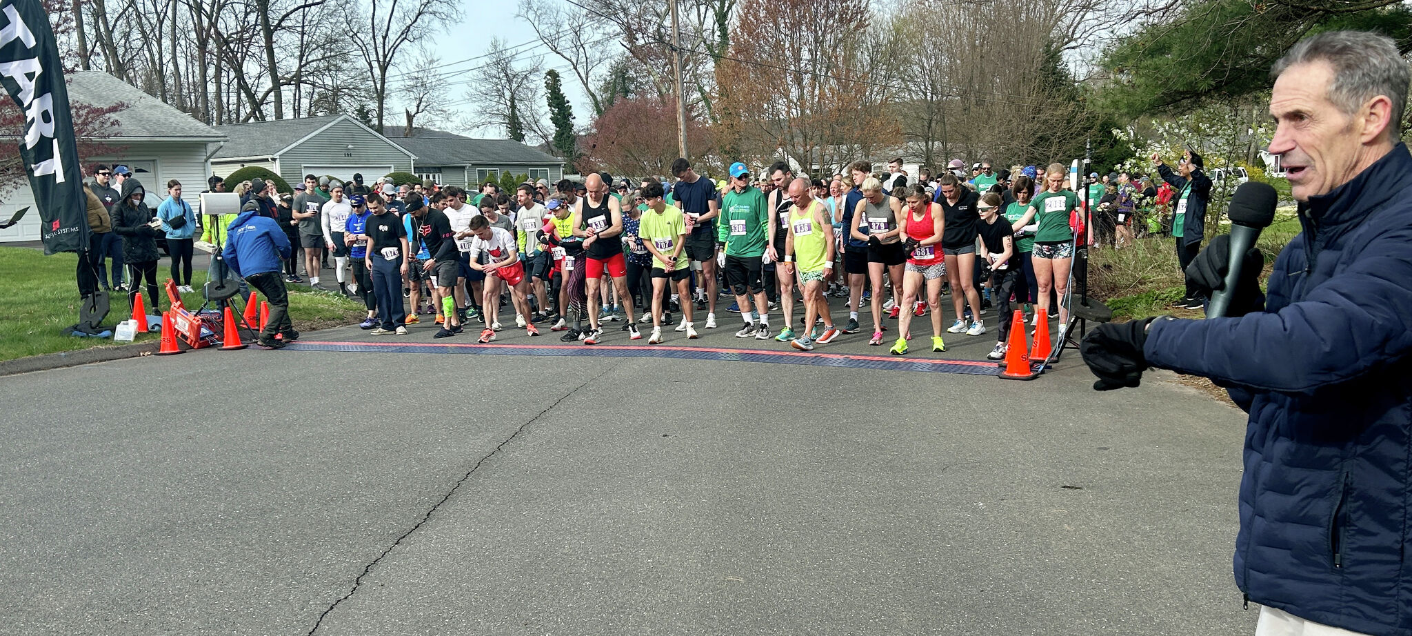 Race announcer Mark Gilhuly accepts award for fight against cancer