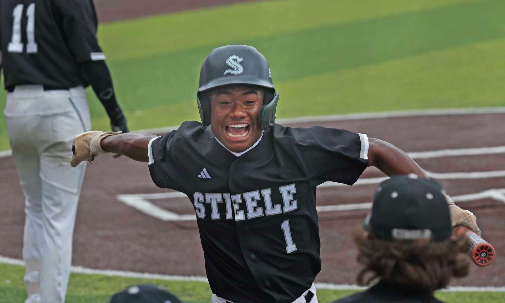 Steele evens playoff baseball series with Johnson