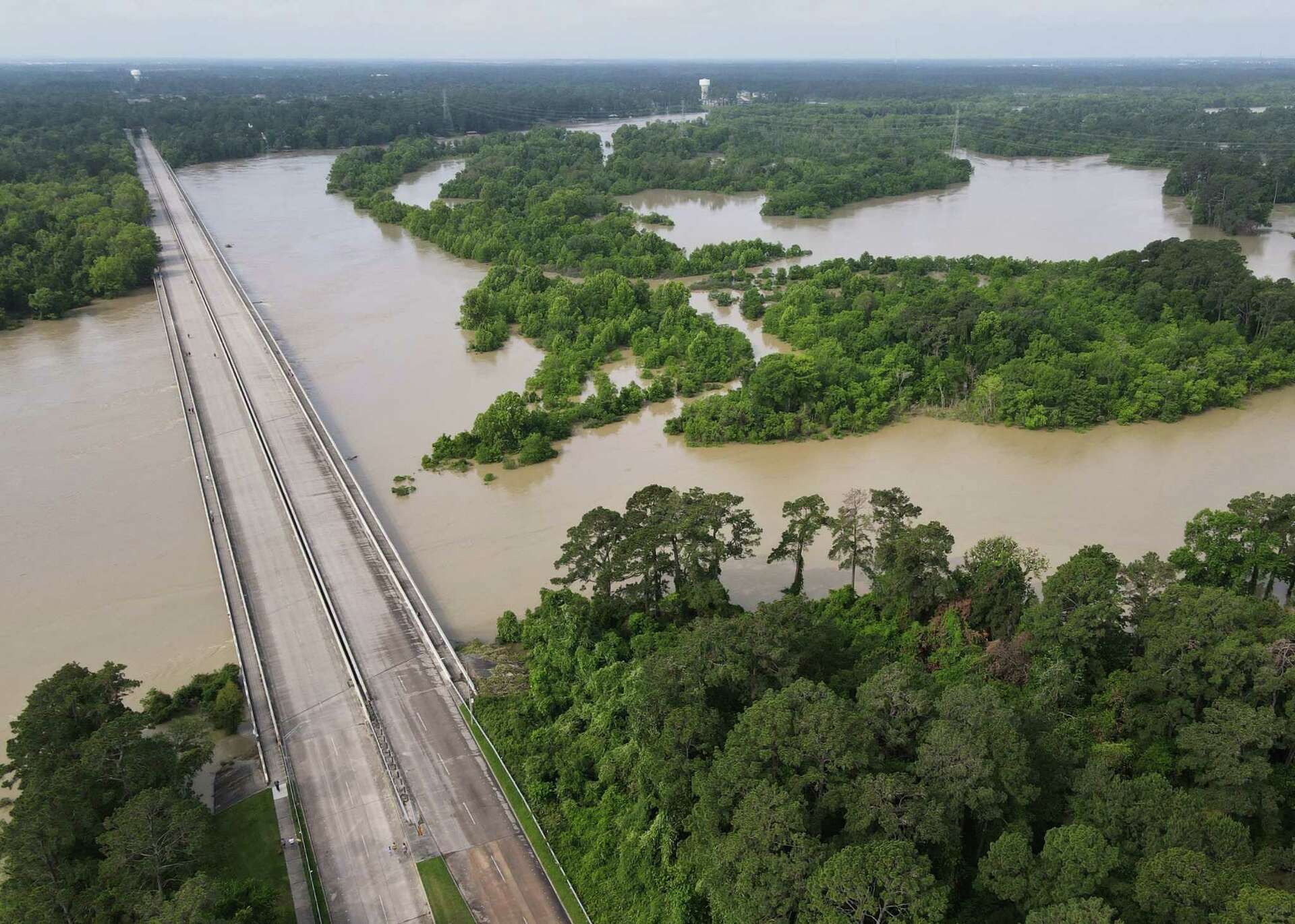 Atascocita residents wait for water to crest as flood waters rise