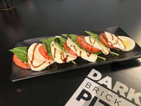 Darkside Pizza shares sneak peek at nostalgic culinary space