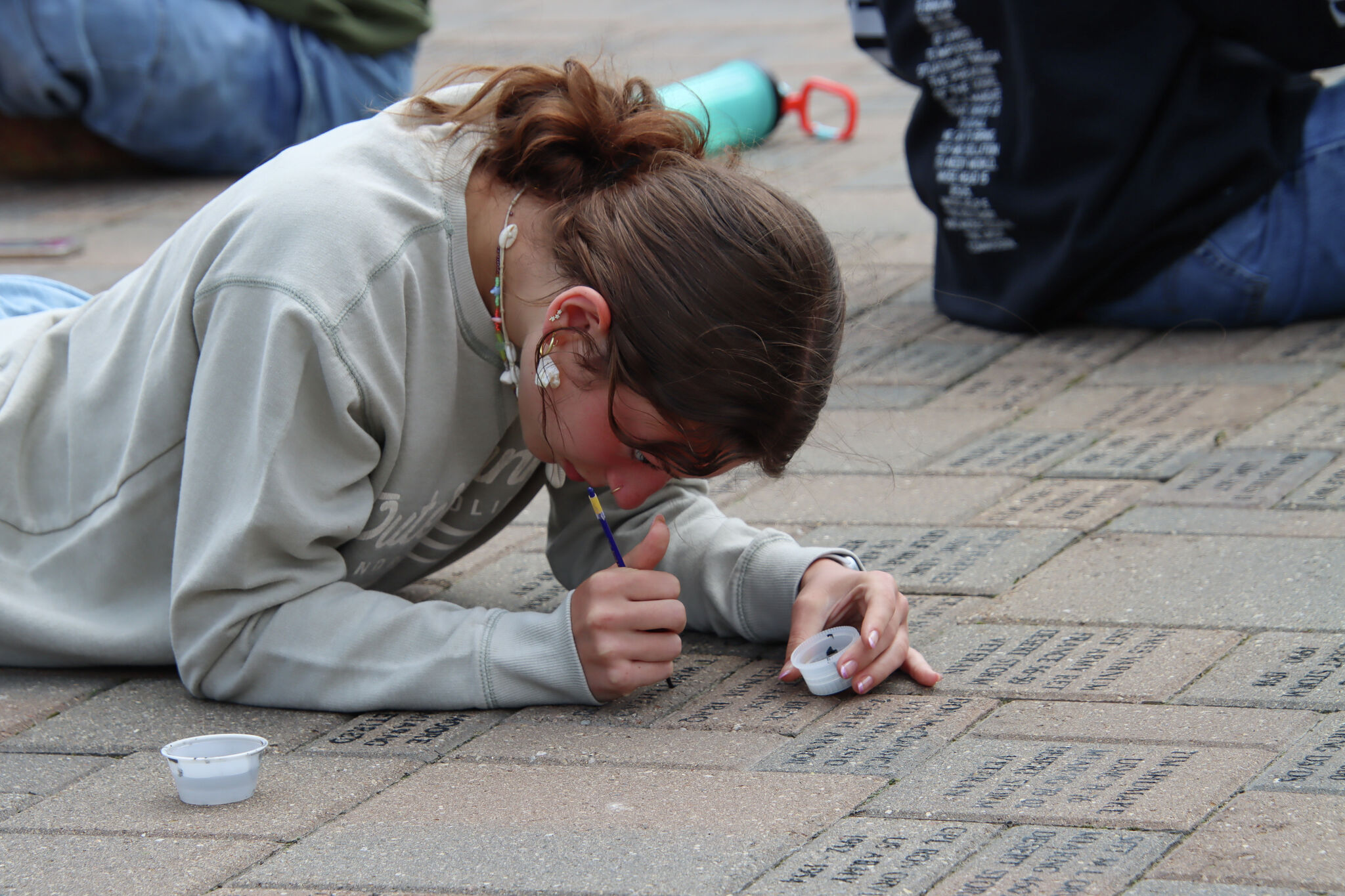 Dow High art students to repaint Veterans Memorial bricks on May 12