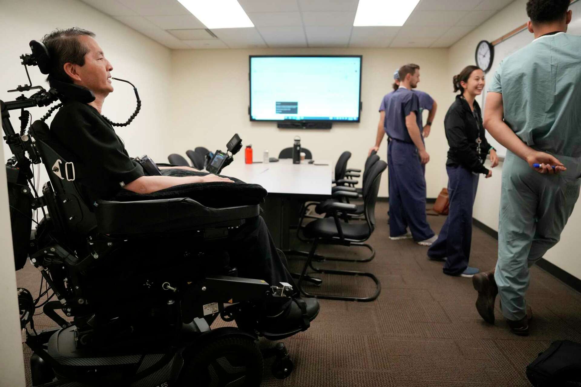 Paralyzed Houston spinal surgeon Dr. Rex Marco returns to UTHealth