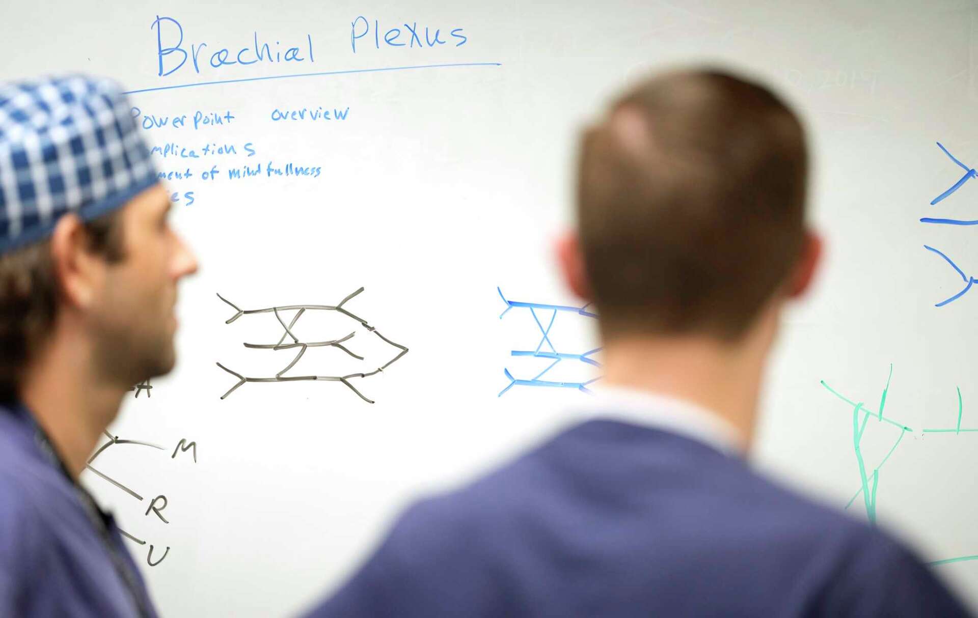 Paralyzed Houston spinal surgeon Dr. Rex Marco returns to UTHealth