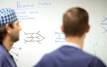 Paralyzed Houston spinal surgeon Dr. Rex Marco returns to UTHealth