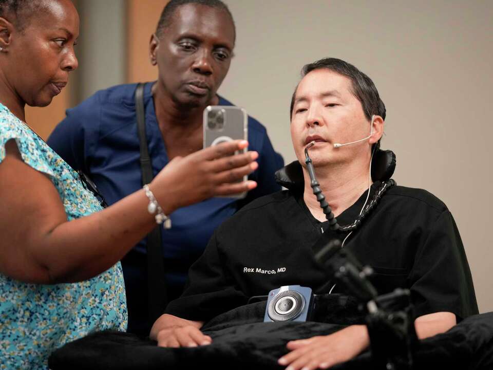 Paralyzed Houston spinal surgeon Dr. Rex Marco returns to UTHealth