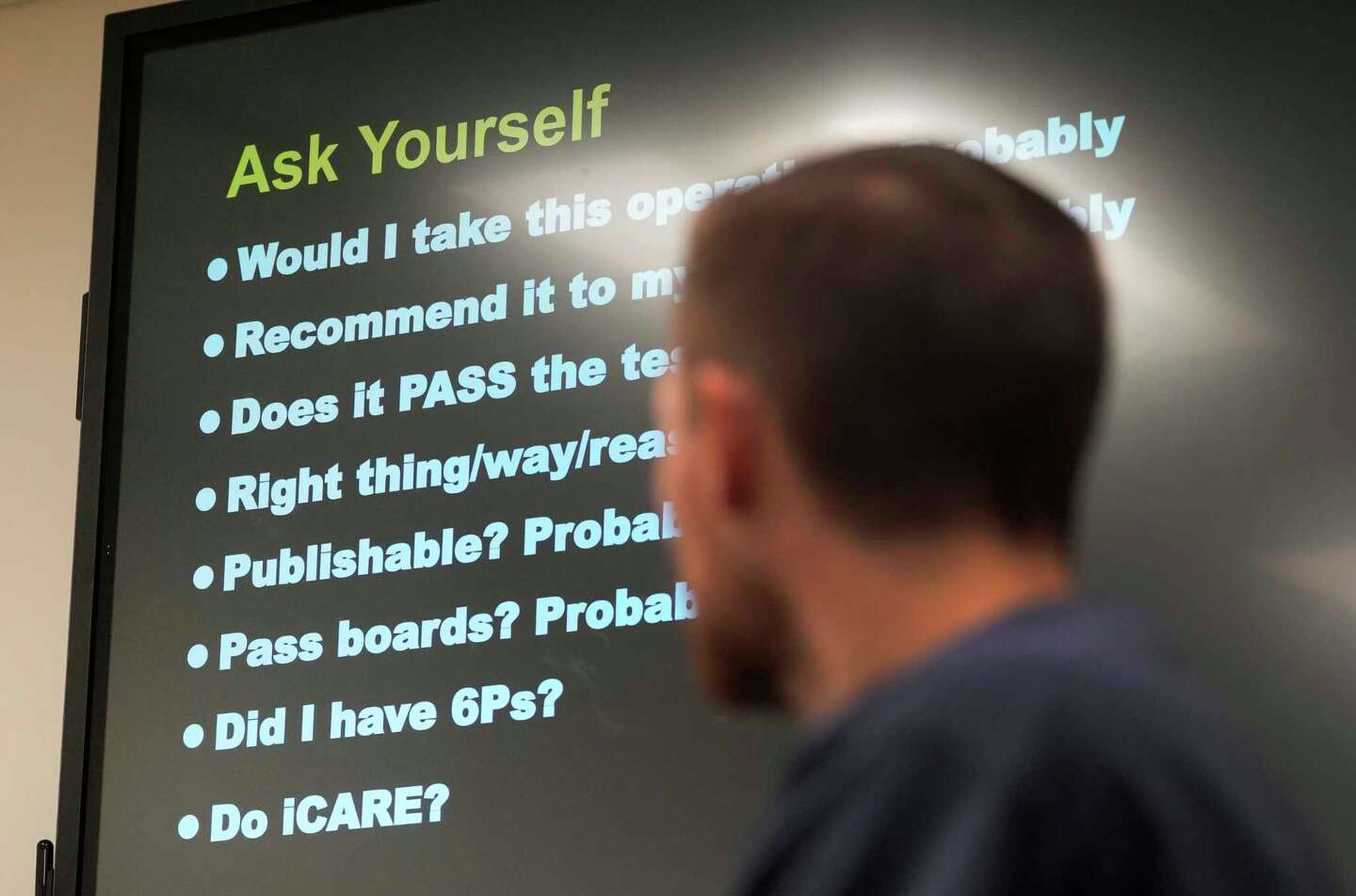 Paralyzed Houston spinal surgeon Dr. Rex Marco returns to UTHealth