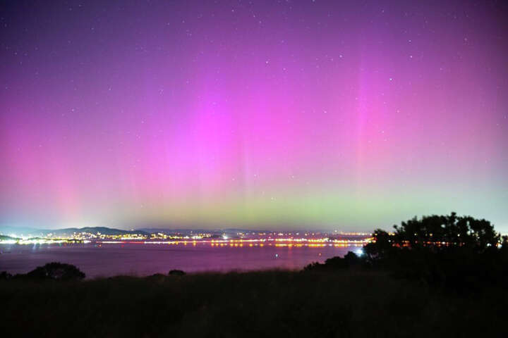 Northern lights illuminate the San Francisco Bay Area night sky