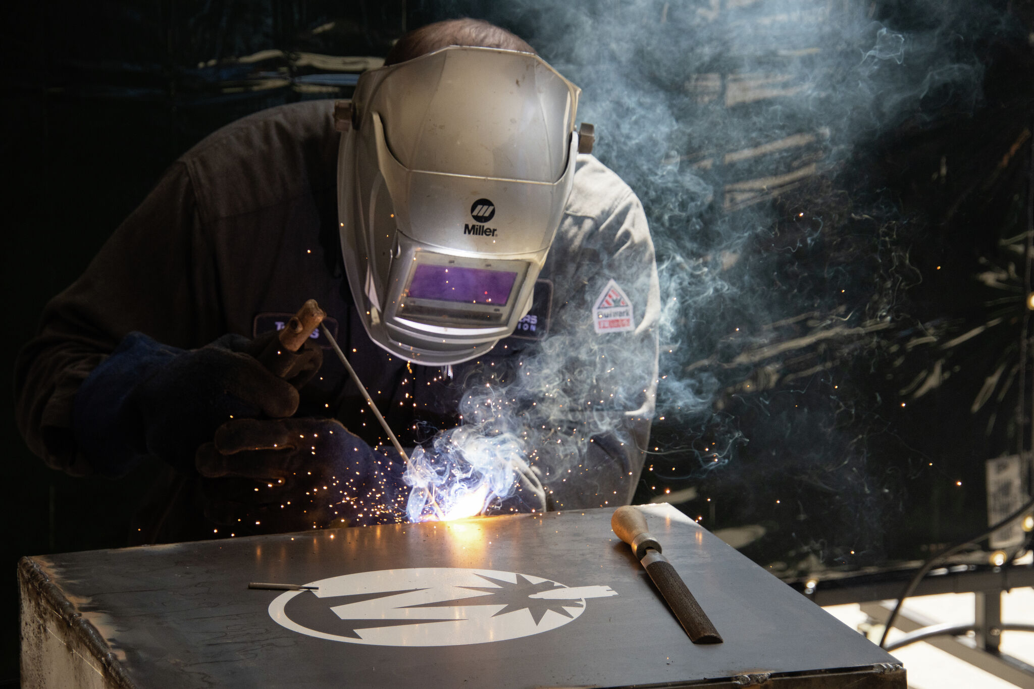 SEEN: Professional welders and students work together