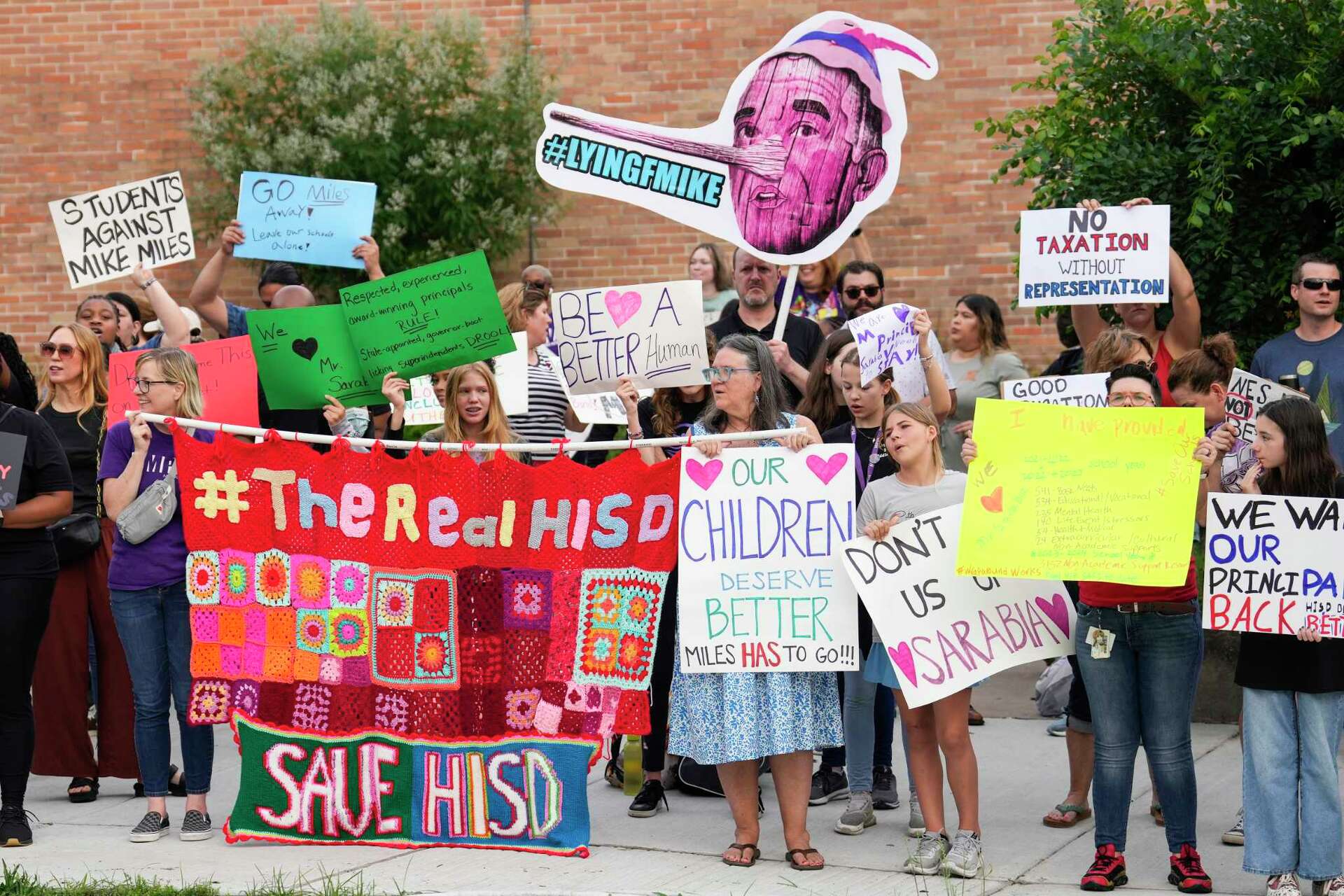 HISD parents protest requests to resign, job cuts at schools
