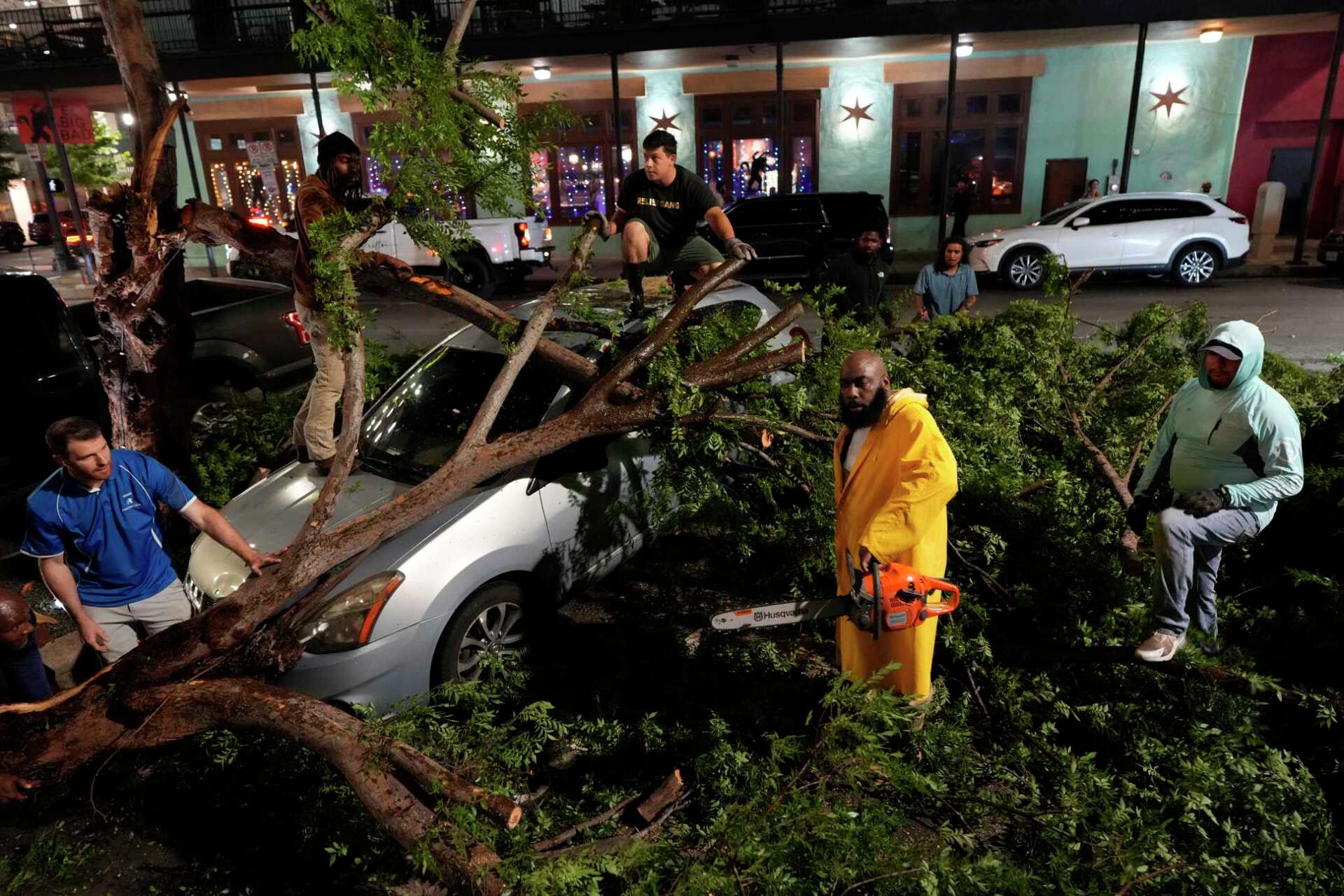 Houston rapper Trae tha Truth helps clear storm damage